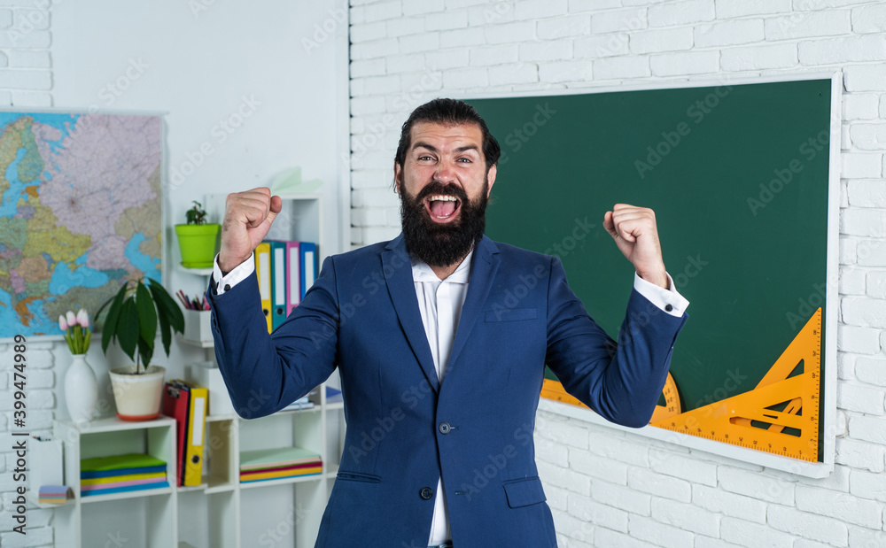 informal education. successful male student sit in classroom while ...