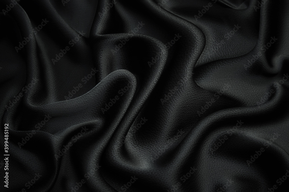 Black fabric texture background, wavy fabric slippery black color ...
