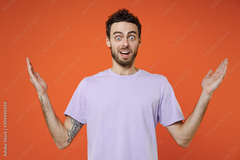 Shocked amazed surprised excited young bearded man 20s wearing basic ...