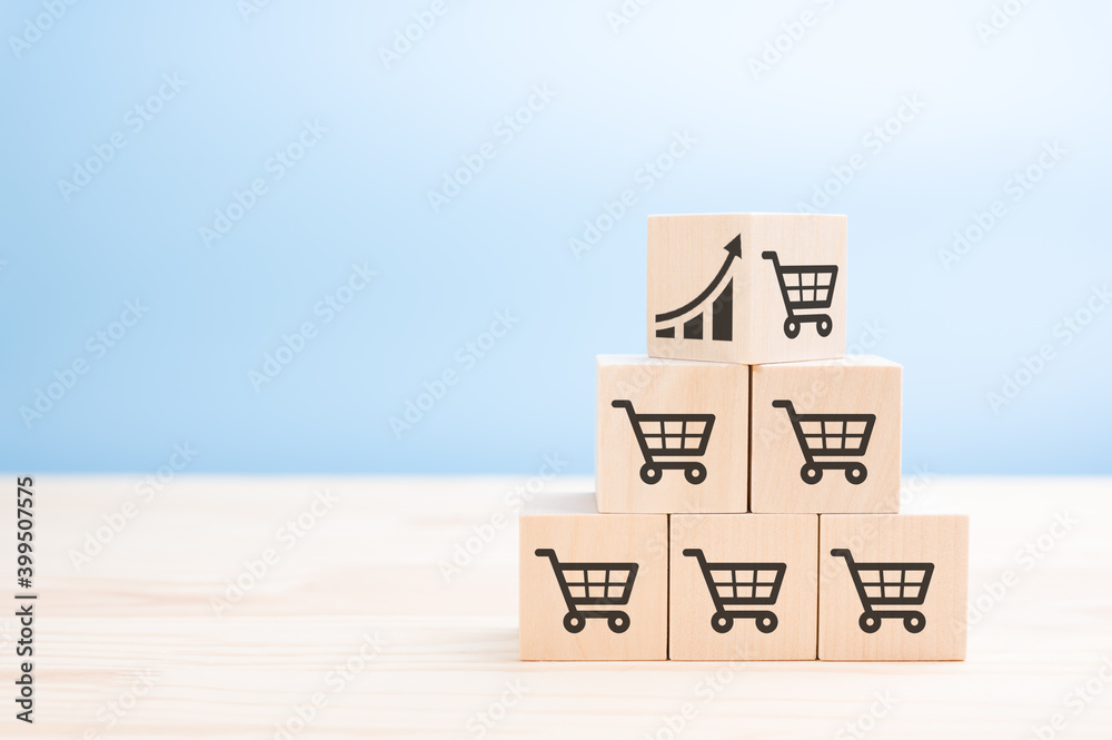 pyramid of wooden cubes with sales icons. Sale volume increase make ...