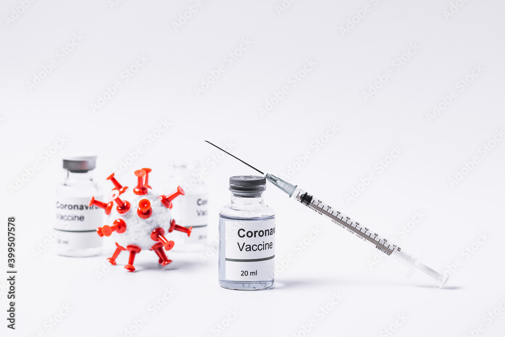 Covid -19 vaccine vial and injection syringe isolated on white ...