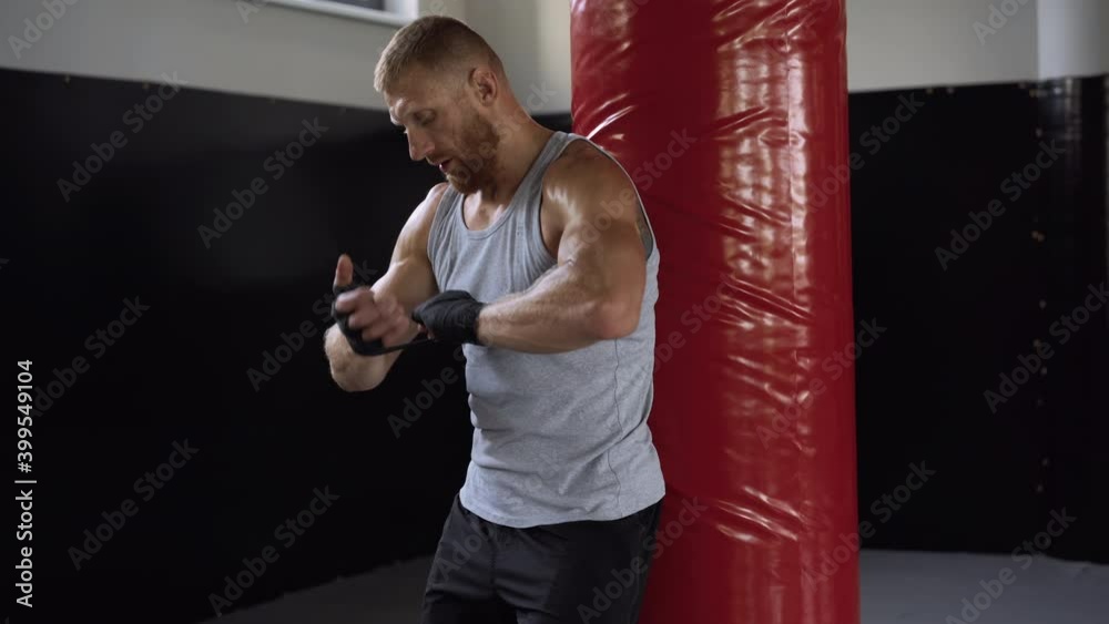 Boxer man wrapping hand Boxing sport Fighter defense arm wrap bandage ...