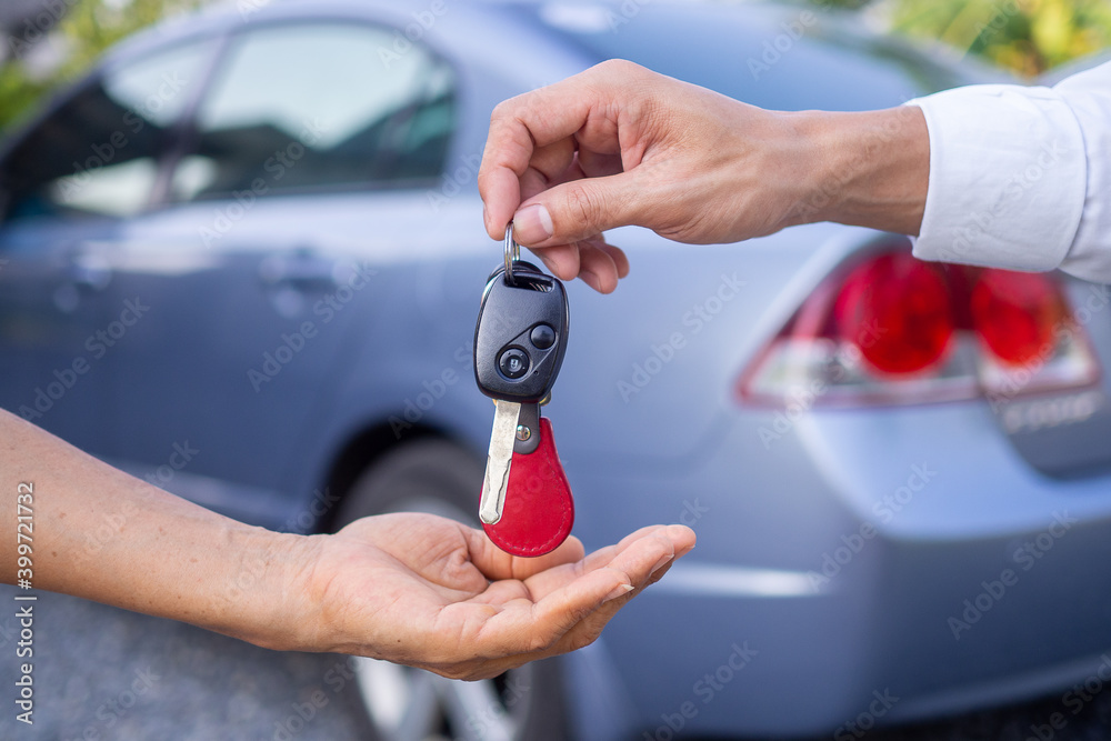 Sales agencies are selling cars and giving keys to new owners. sell car ...