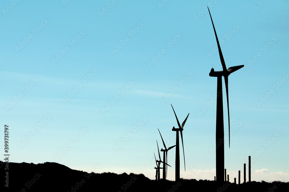 Silhouette of Wind Turbines Stock Photo | Adobe Stock
