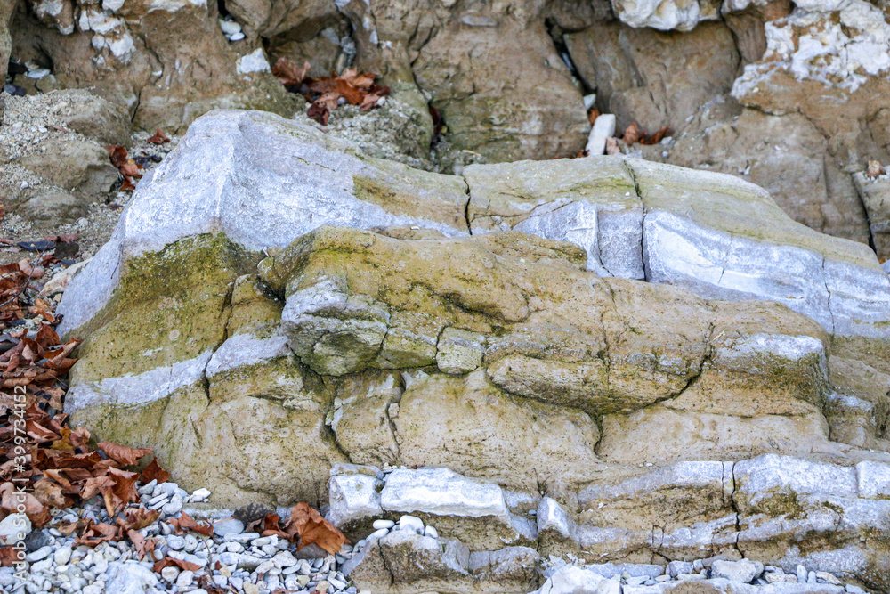 mountain textures of stones with interlayers of gypsum, colored quartz ...