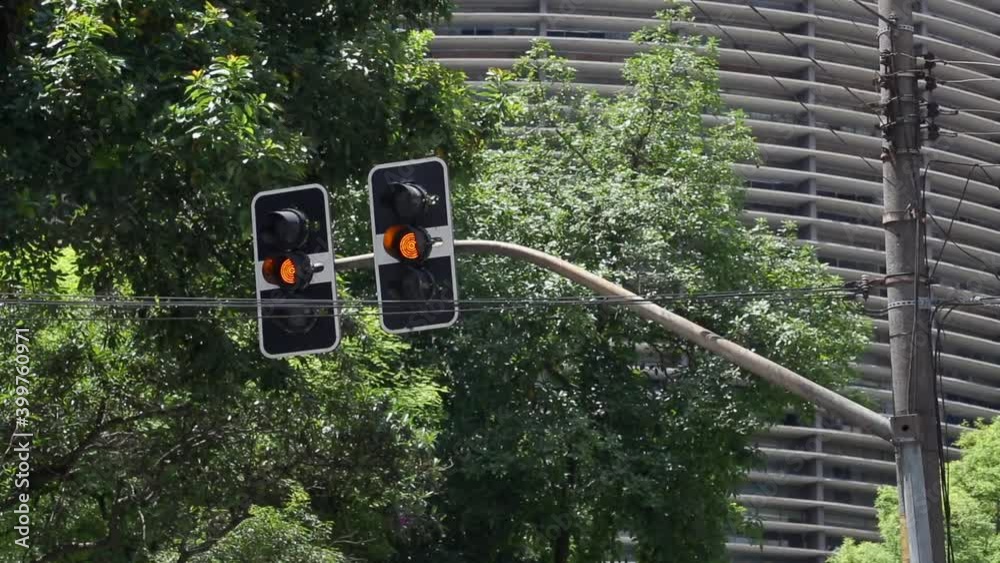 Traffic lights in downtown Sao Paulo, Brazil changing from green ...