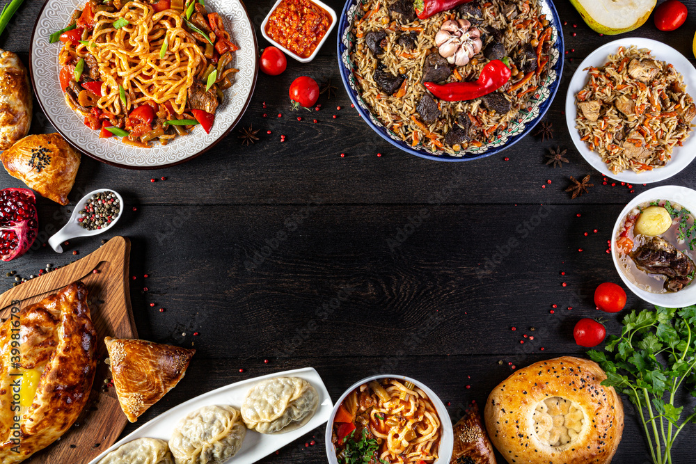 The concept of oriental cuisine. Assorted Uzbek food set, pilaf, samsa ...