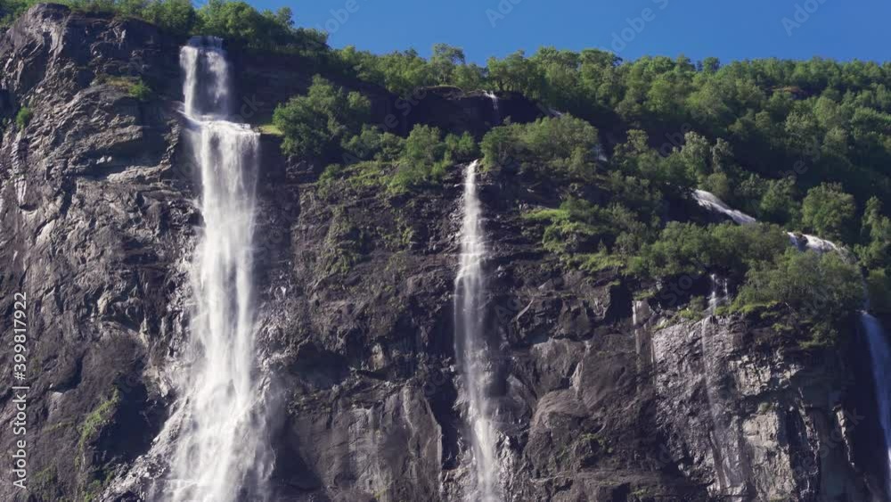 The Sven sisters waterfall - an iconic feature of the Geiranger fjord ...