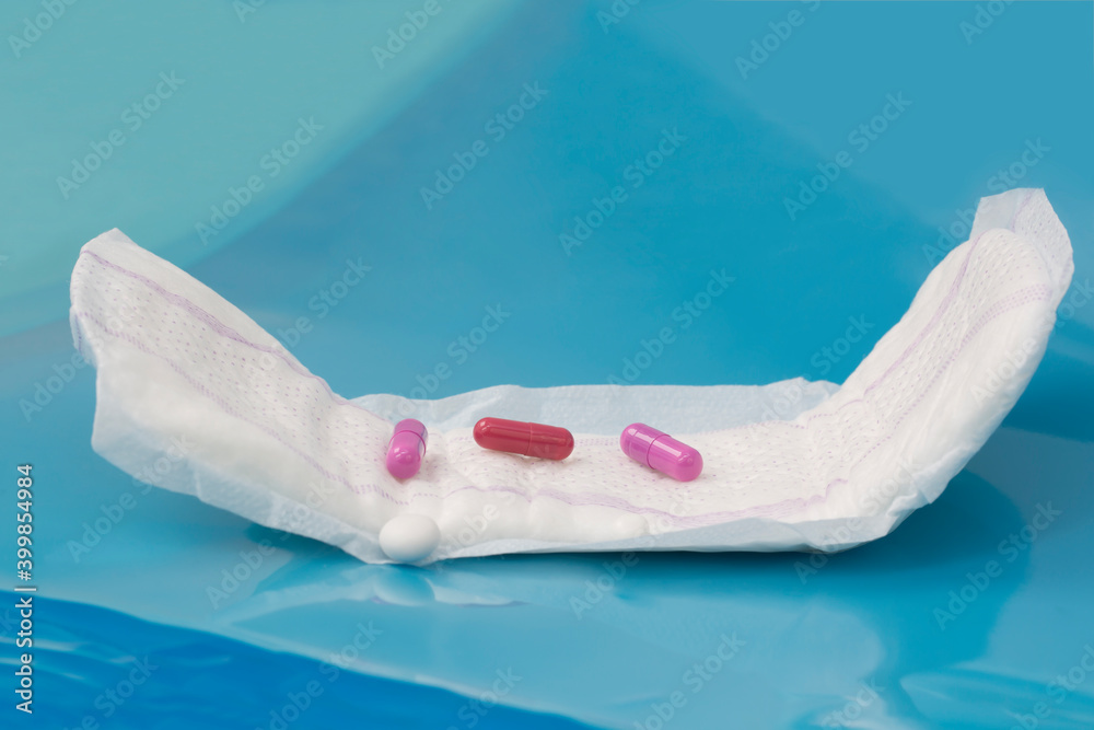 Pain relieving drugs for menstrual cramps concept. Medication on ...