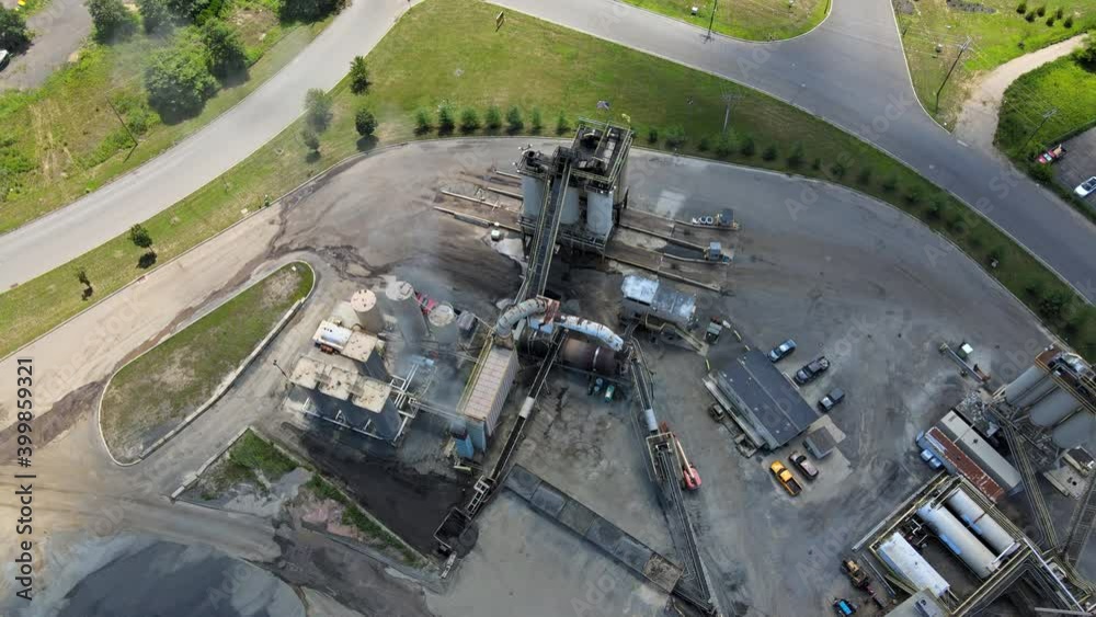 Asphalt production factory with bitumen in station of heavy machinery ...