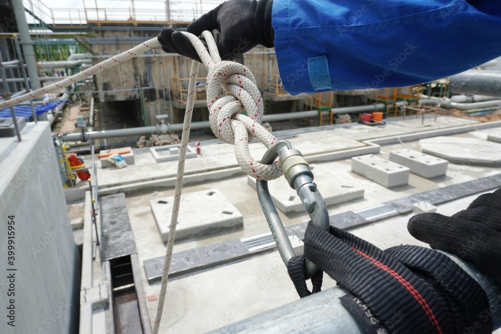 Industrial rope access equipment descenders rigged as lowering rescue ...