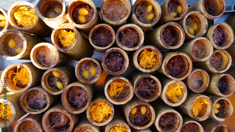 "Khao Lam" Thai dessert made from coconut milk and sticky rice in ...