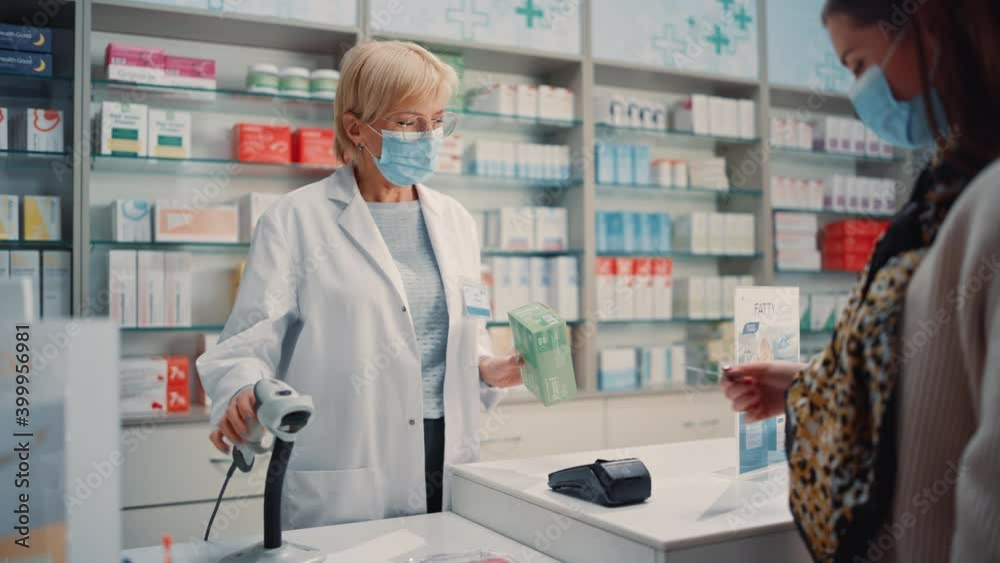Pharmacy Drugstore Checkout Cashier Counter: Pharmacist and Young Woman ...