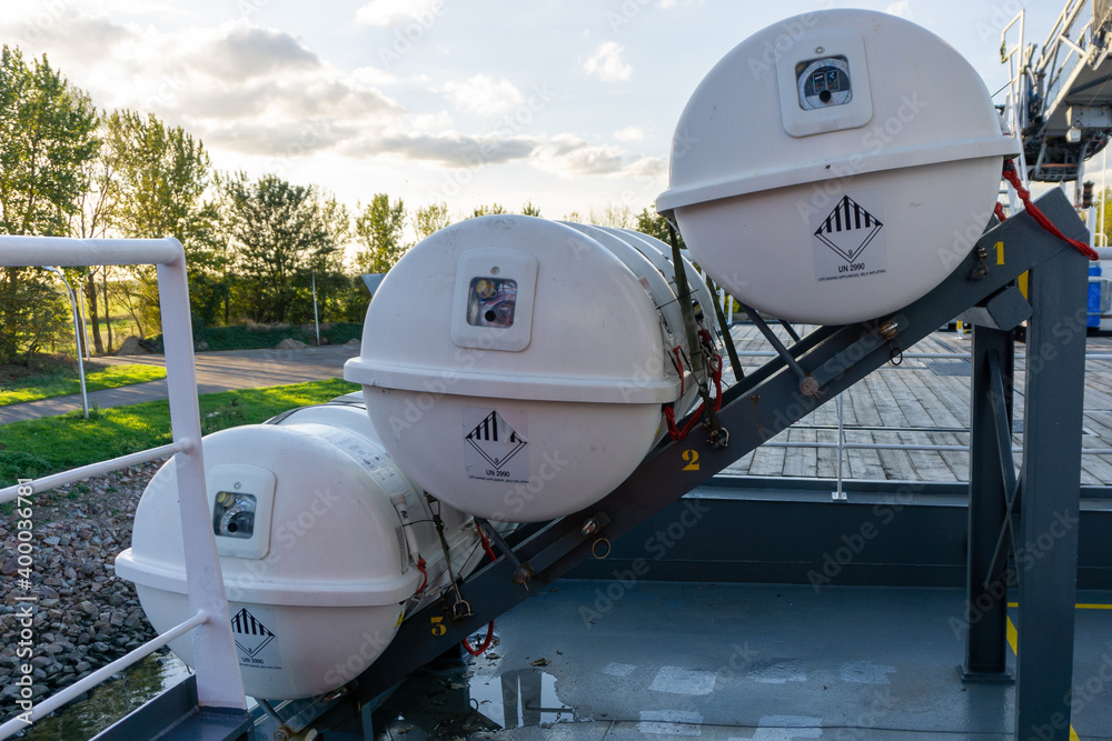 Life rafts on board the walk to work offshore vessel. Life raft ...