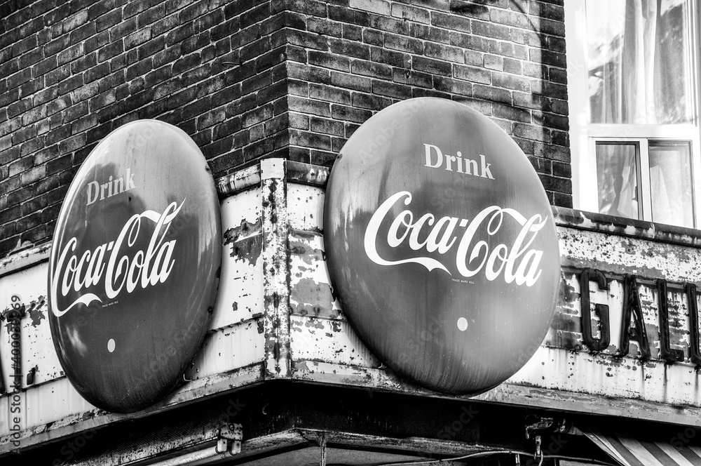 TORONTO, CANADA - SEPT 19, 2009 Two large vintage Coca Cola button ...