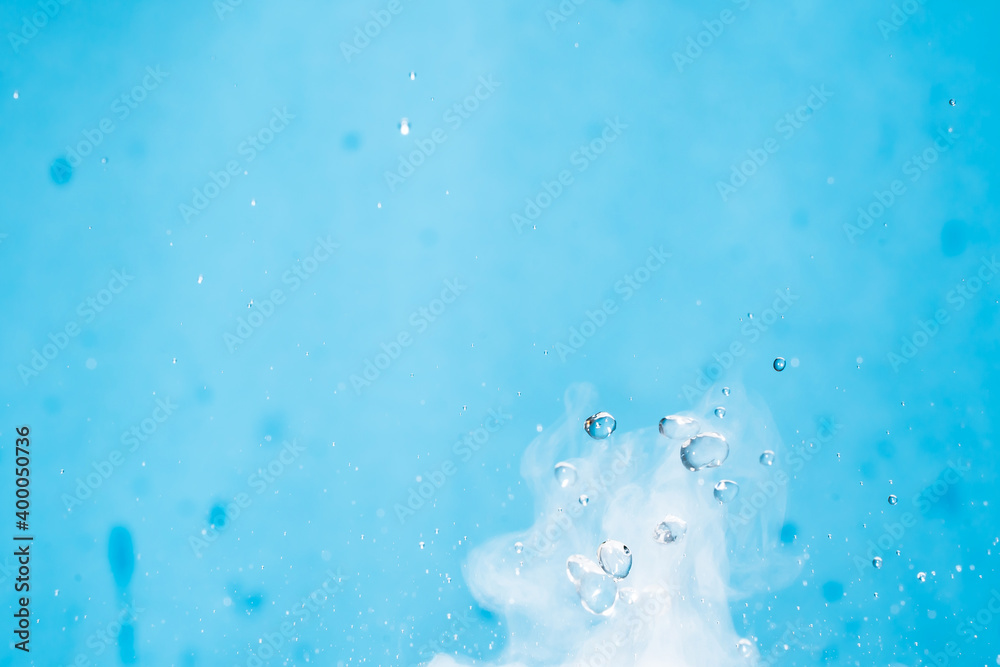 Water drop. Chemical reaction with boiling swirling water splashes ...