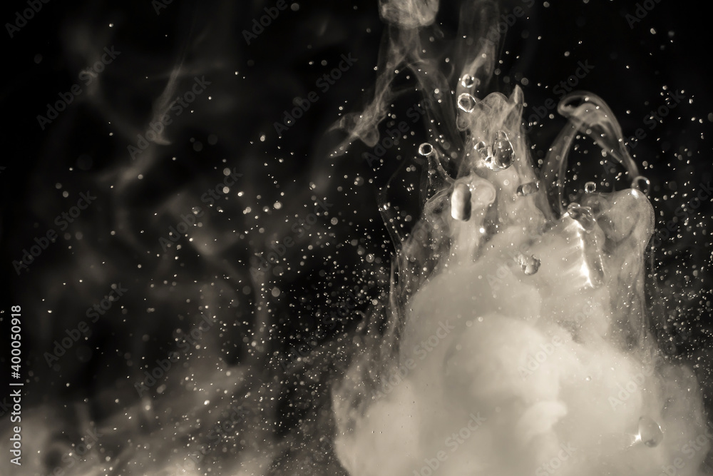 Water drop. Chemical reaction with boiling swirling water splashes ...