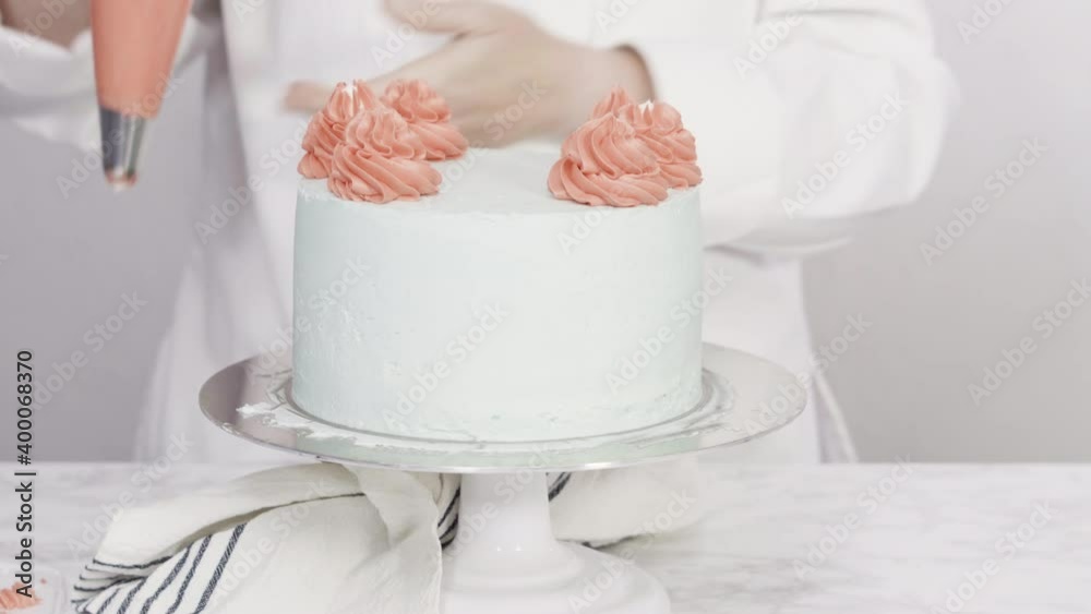 Step by step. Piping buttercream rosettes on top of round three-layer ...
