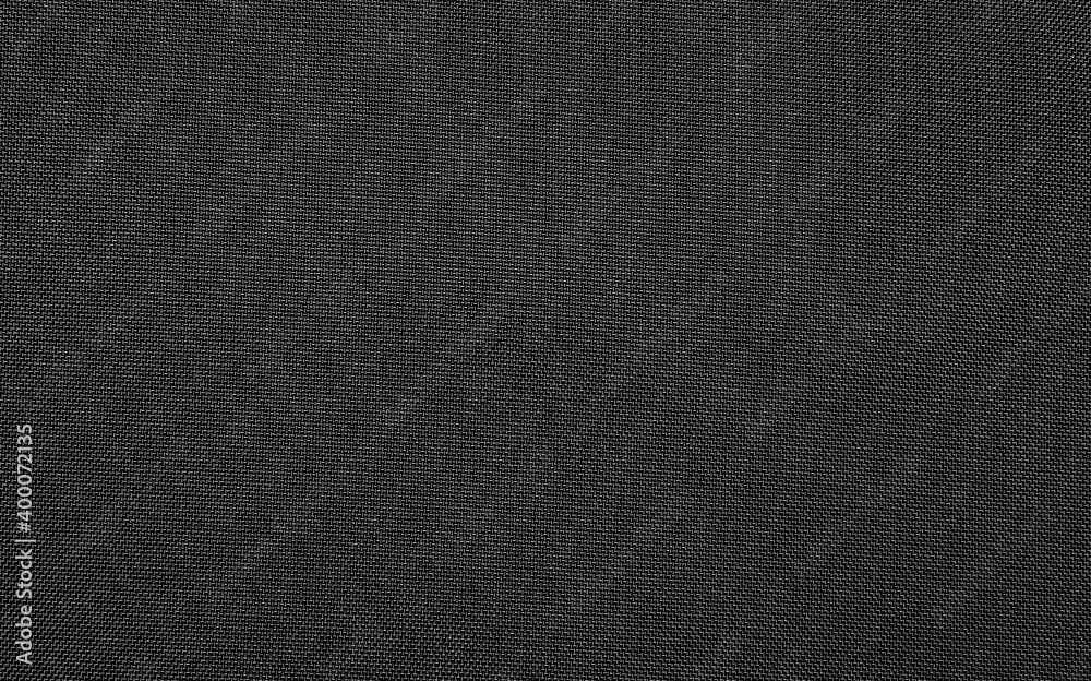 Synthetic black nylon fabric.Texture of dense black fabric.The ...