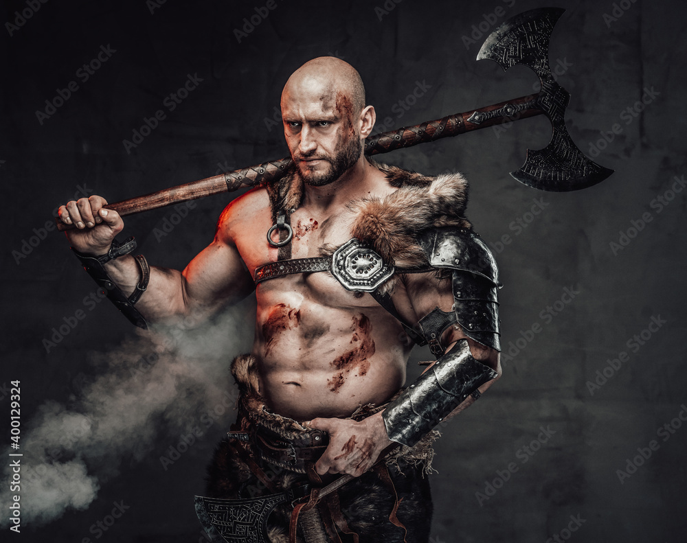 Portrait of a furious viking warrior with grimy and bloody skin in ...