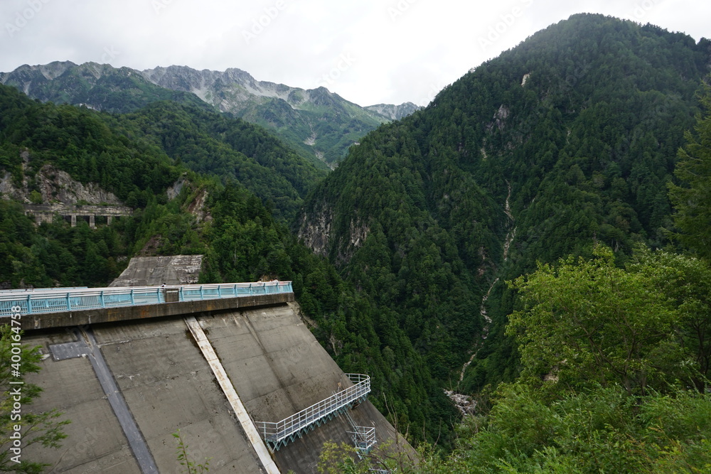 Kurobe Dam and lakeside mountains in Tateyama Kurobe Alpine Route ...
