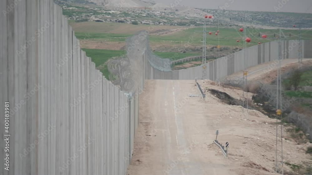 The separating wall between Israel and the Palestinian territories with ...