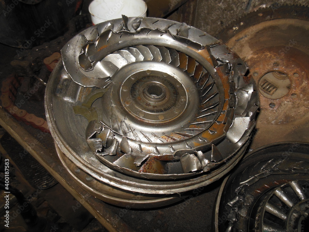 damaged and good internal parts of a torque converter for automotive ...