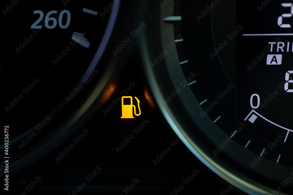 Empty fuel warning light in car dashboard. Fuel pump icon. gasoline ...