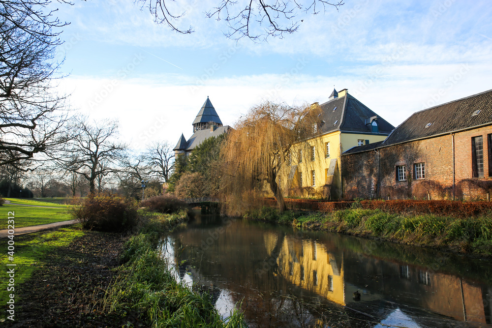 Panoramic view over moat on medieval water castle and hunting lodge ...