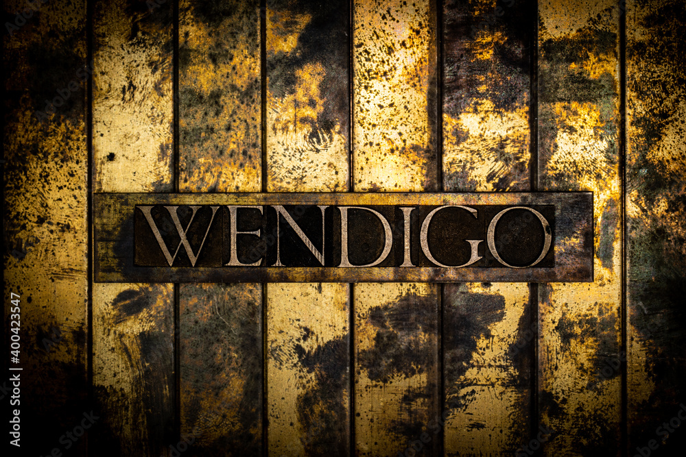 Wendigo text on grunge textured copper and gold background Stock ...