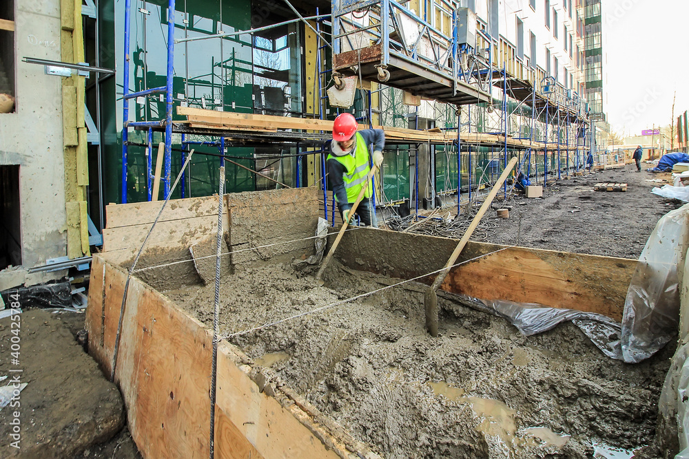 Bar bender fixing steel reinforcement for house concrete floor slab ...
