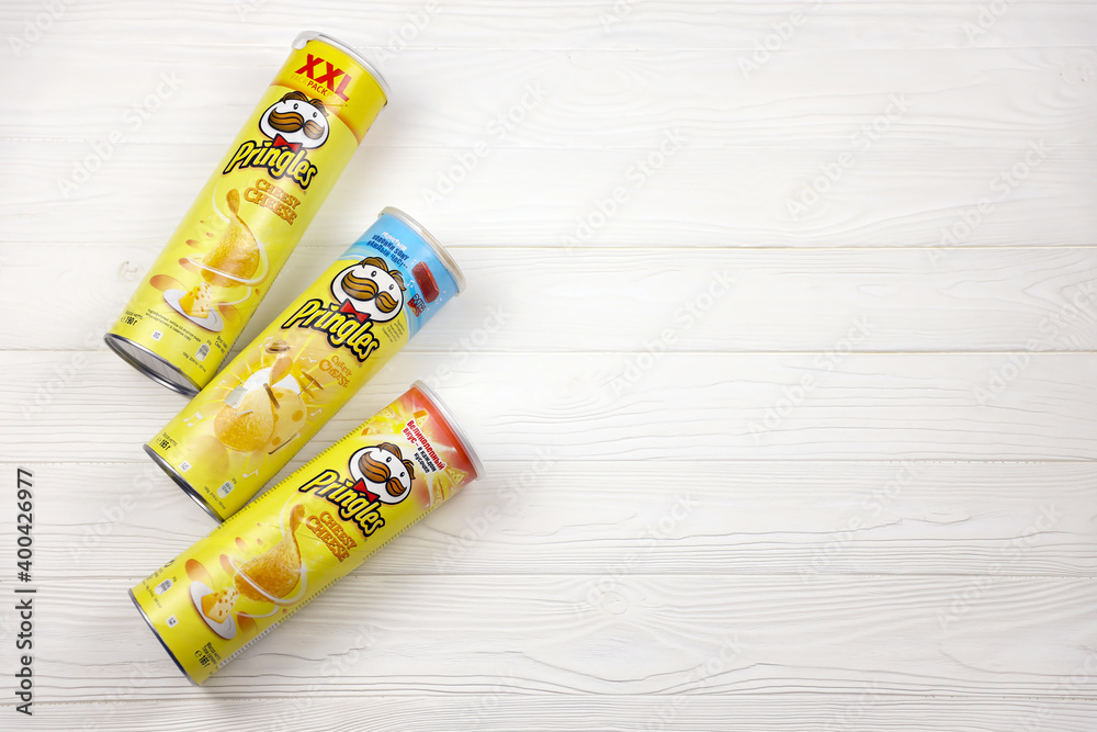 Pringles cheesy cheese flavour. Cardboard tube cans with Pringles ...