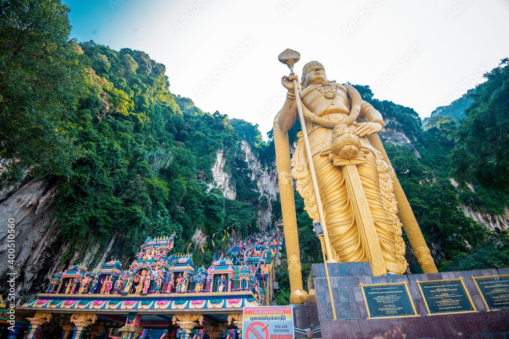 The famous and iconic limestone with rainbow colored stairs at Murugan ...