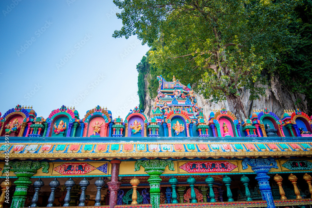 The famous and iconic limestone with rainbow colored stairs at Murugan ...
