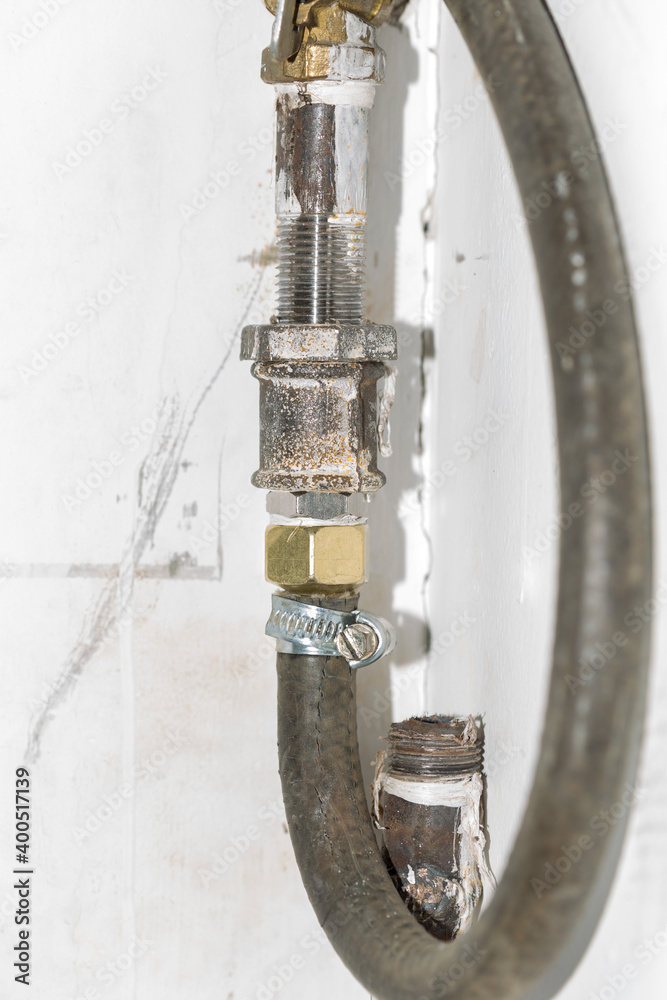 clamp connection with hose and gas pipe at home Stock Photo | Adobe Stock