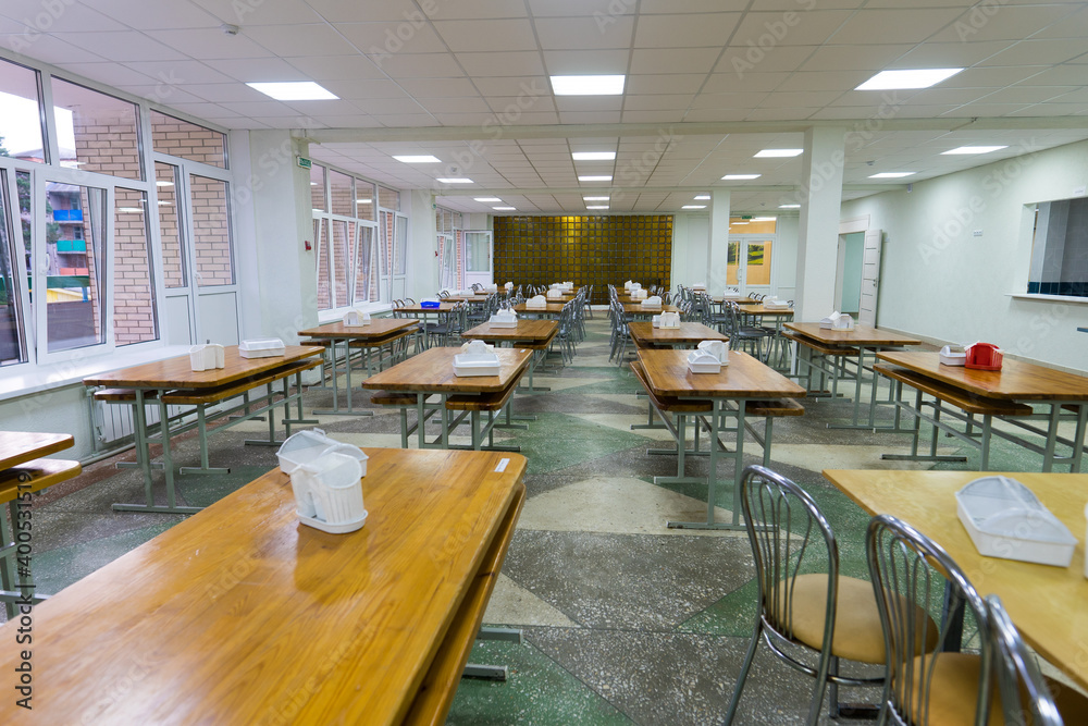 Chairs and tables. The dining hall in school is quarantined, isolation ...