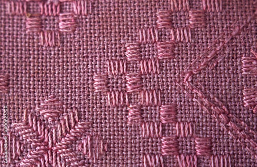 pink linen natural fabric with embroidery pattern - close up, textile ...