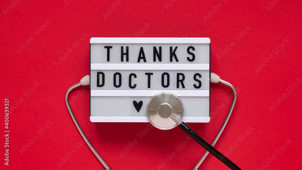 Text board for with text thank you doctors,stethoscope on red ...