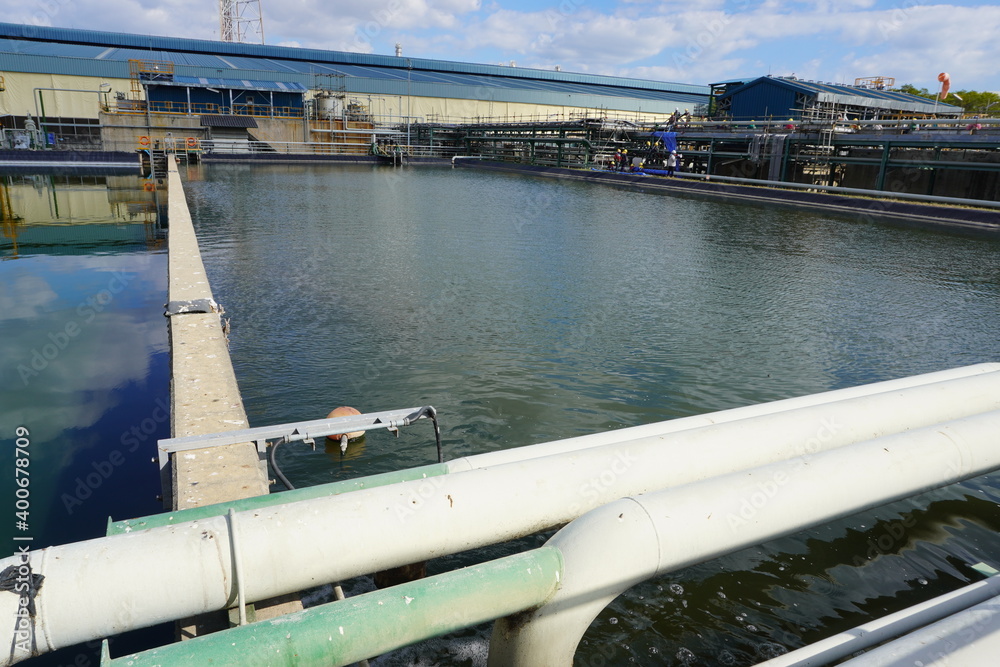 Waste water treatment ponds in chemical plants are pumping waste water ...