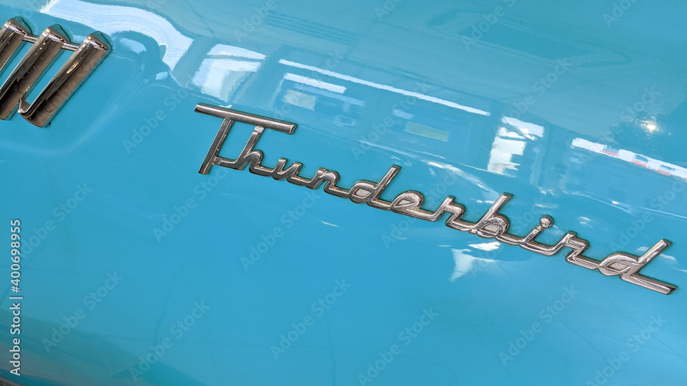 Ford Thunderbird logo and sign text on side of retro vintage luxury car ...