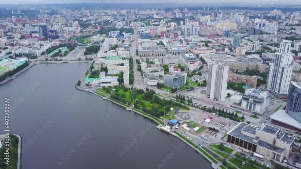 Top view of modern city with river in center. Stock footage. Beautiful ...