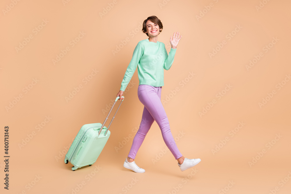 Full body profile side photo of young girl wave hello go walk check-in ...