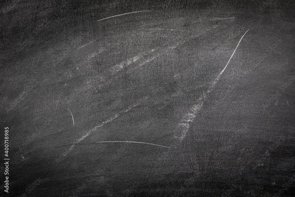 Black chalk board with scratches and white lines. Space for text and ...
