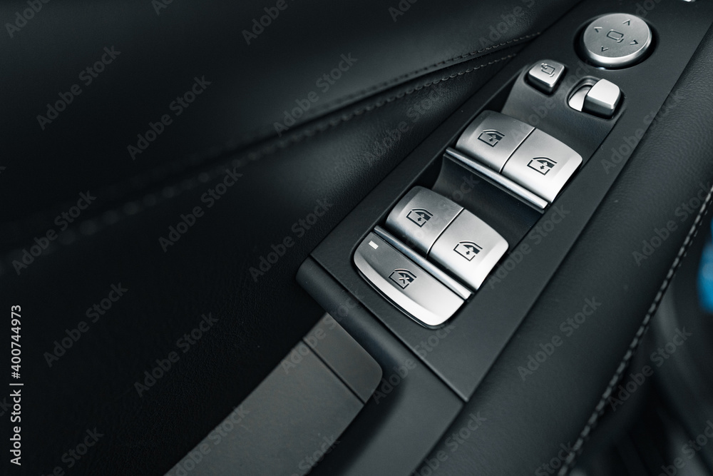 Window lifter button in a luxury car Stock Photo | Adobe Stock