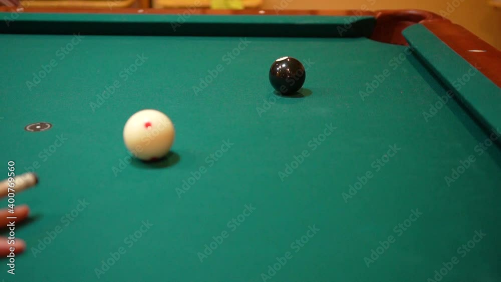 Slow Motion Billiards Person Shooting solid black 8 ball in corner ...