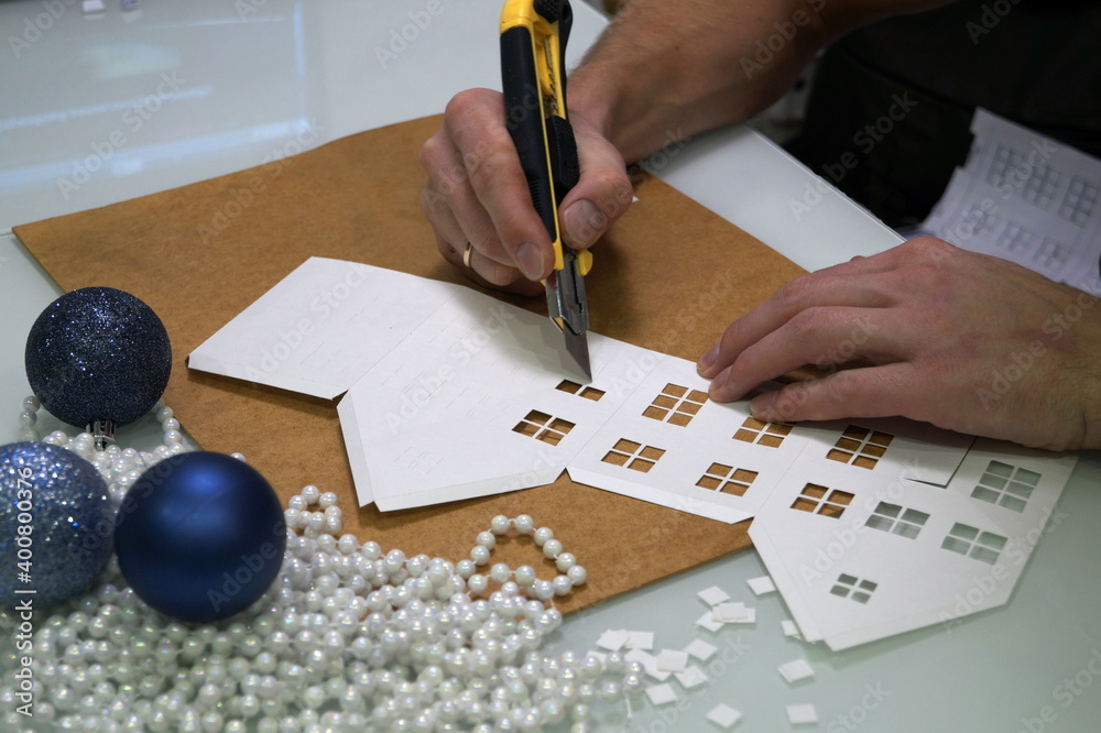 Making a house with lighting with your own hands by cutting out of ...