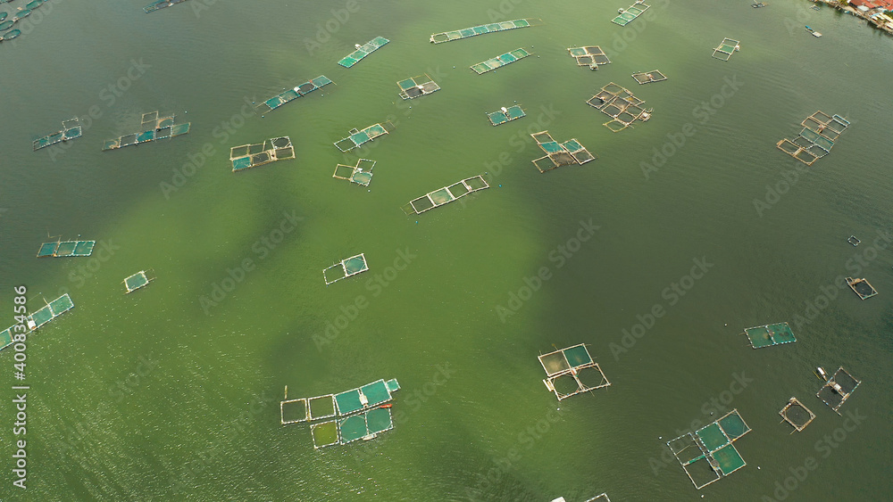 Foto de Aerial view of fish farm with cages for fish and shrimp on the ...