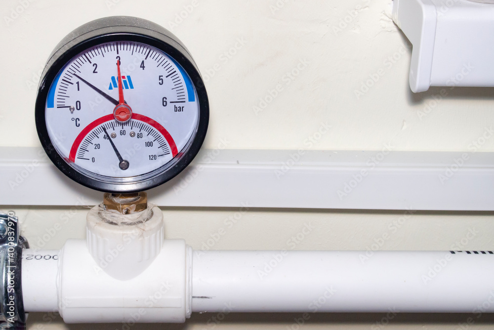 pressure gauge installed in the heating system of the house Stock Photo ...