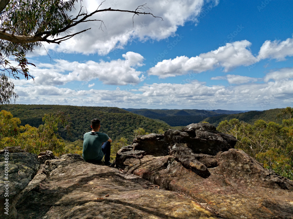 Breathtaking view of mountain and valley landscape on a blue sky with ...