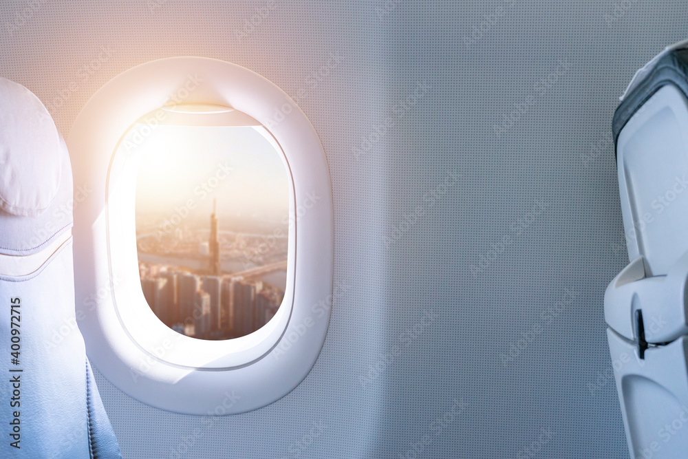 Airplane interior with window view of Ho Chi Minh city, Vietnam ...